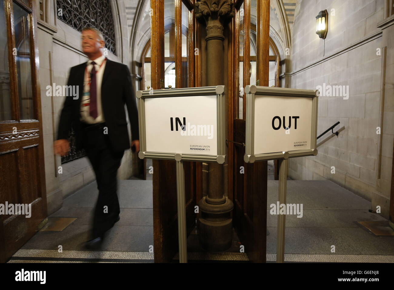 A council worker walks into Manchester Town Hall as counting gets ...