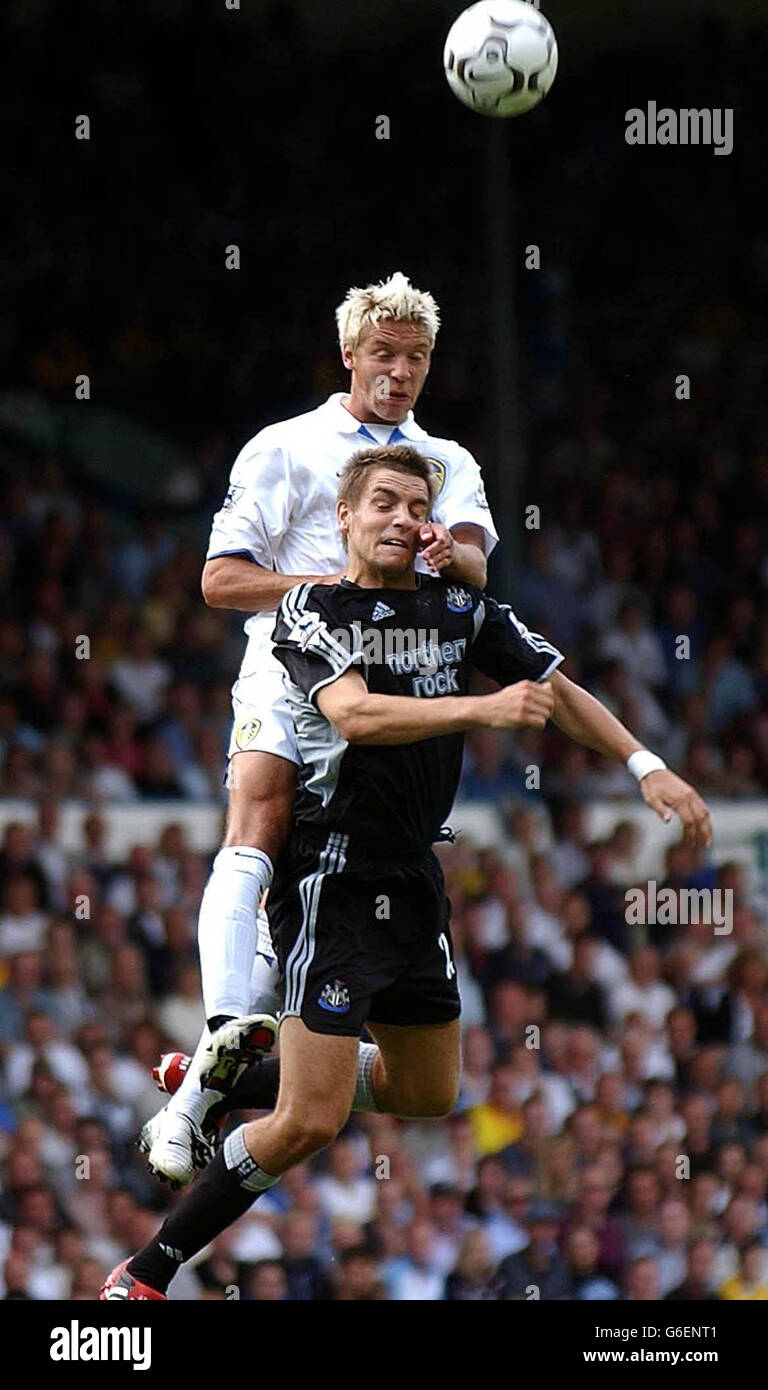Alan Smith of Leeds United climbs above Jonathan Woodgate the former ...