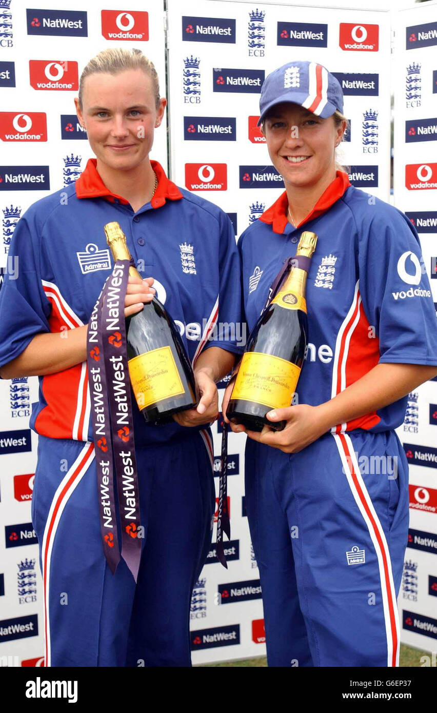 Player of the series England's Laura Newton (L) and captain Claire ...