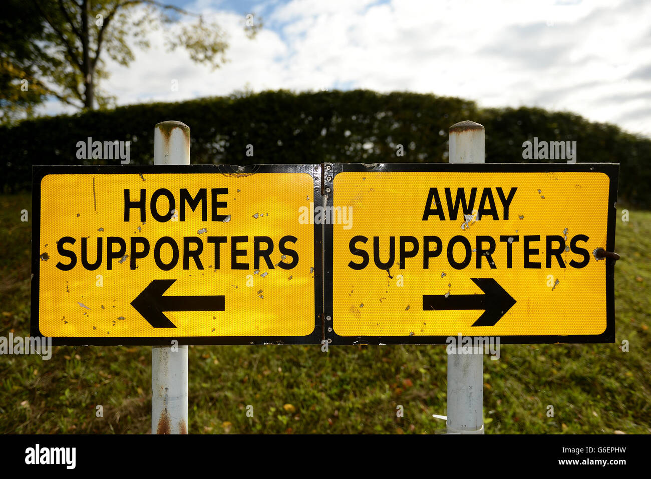 Signage for home and away supporters at the Lamex Stadium Stock Photo ...