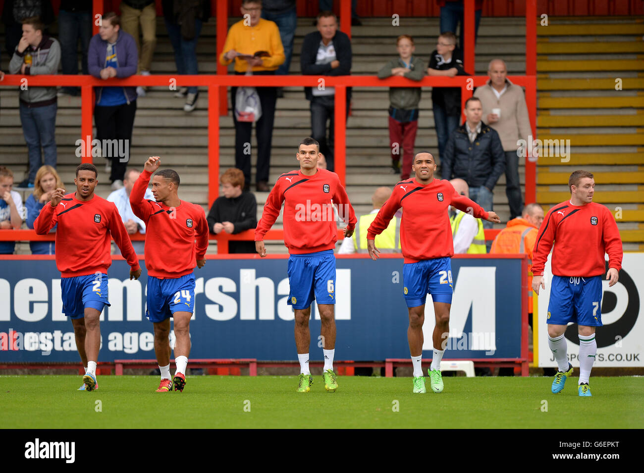 Coventry City players (left to right) Cyrus Christie, Jordon Clarke ...