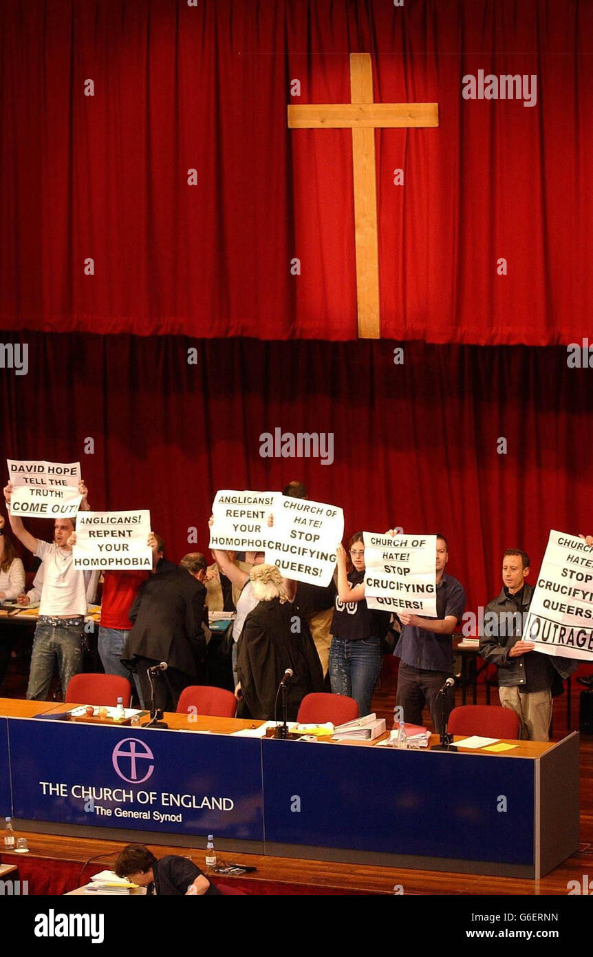 Church of England General Synod delegates leave the stage during the ...