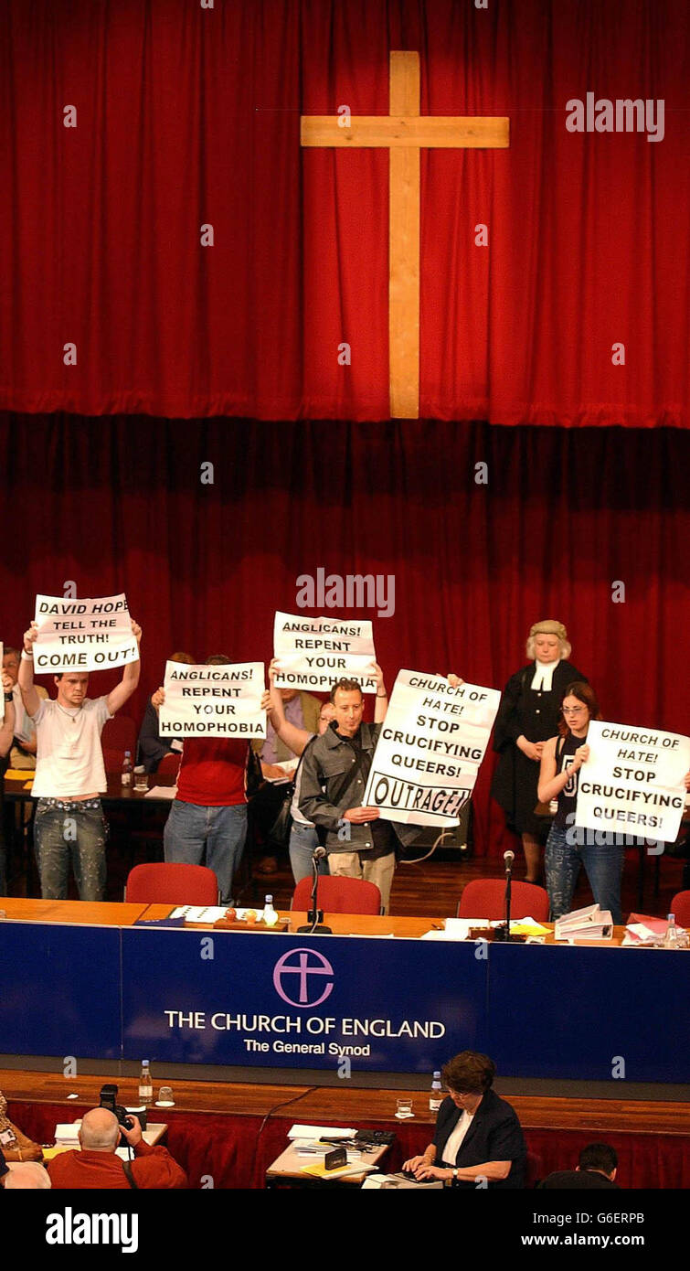 Church of England General Synod delegates leave the stage during the ...