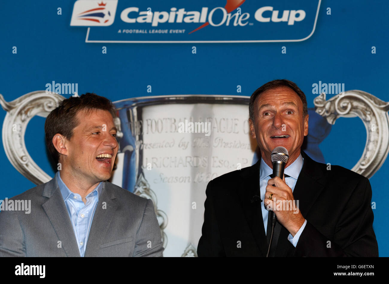 Former Liverpool player Phil Thompson (right) and sky sports presenter ...