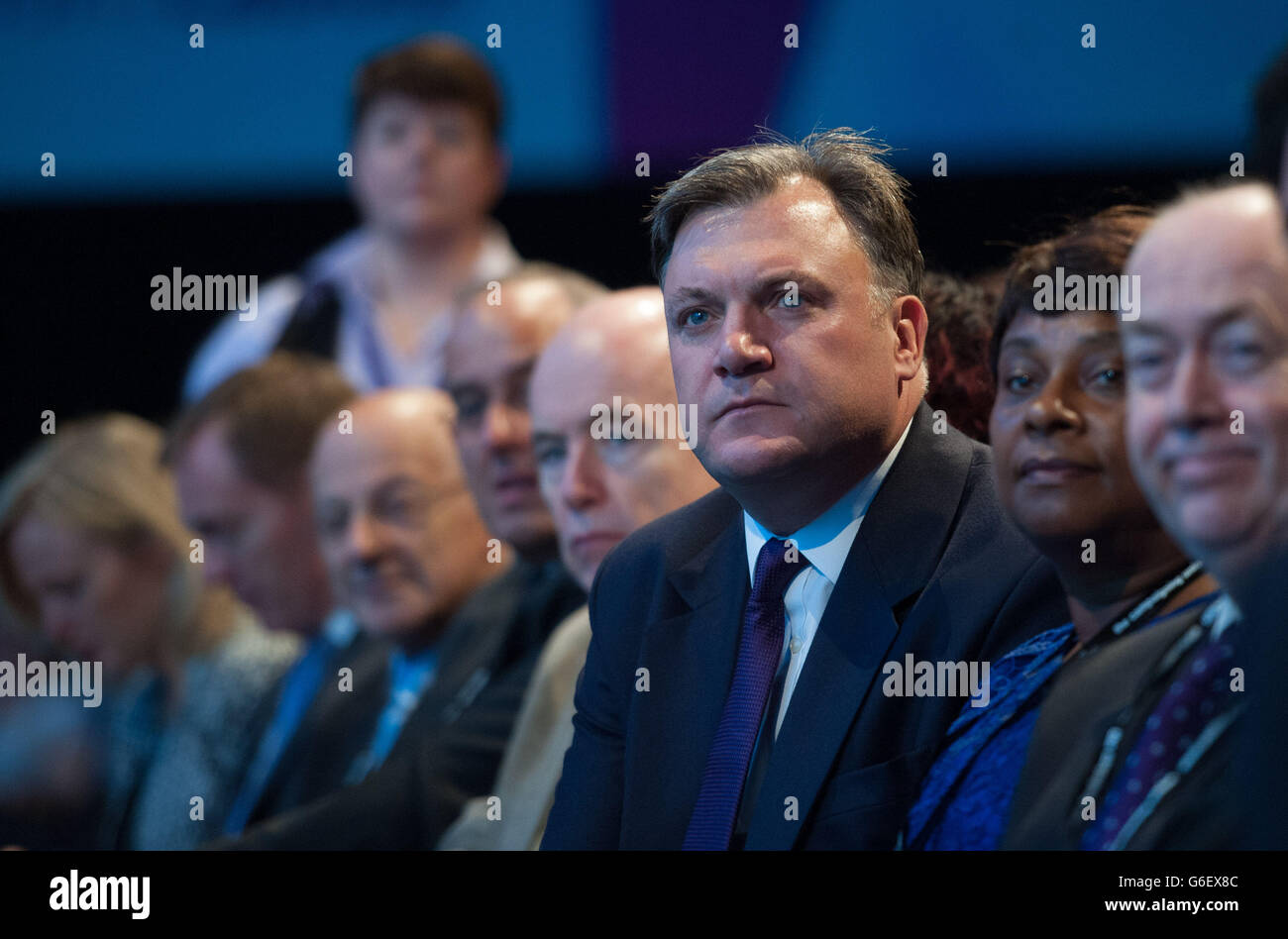Shadow chancellor Ed Balls listens to his wife, shadow home secretary ...