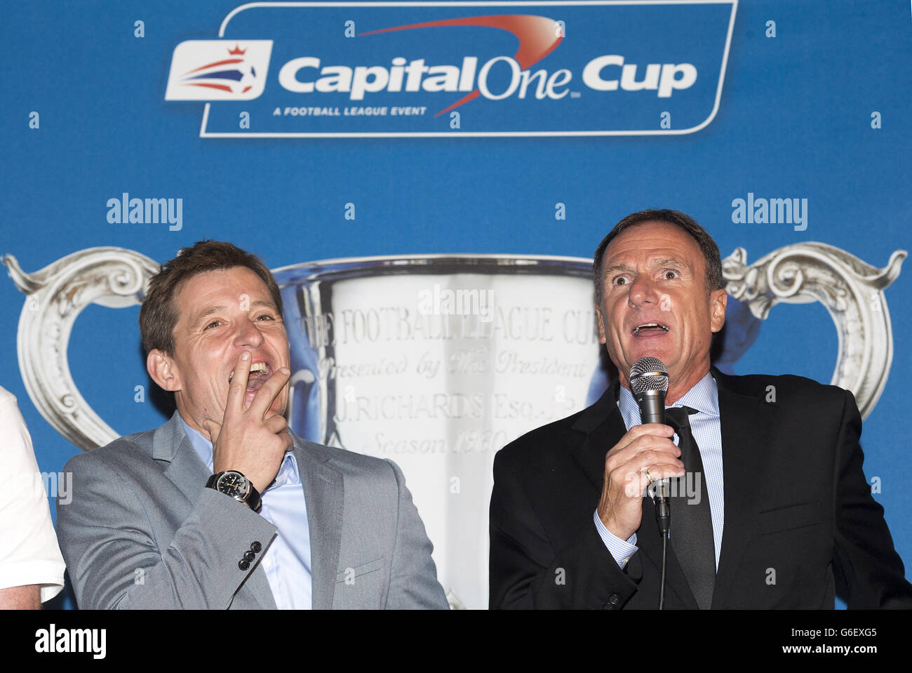 Former Liverpool player Phil Thompson (right) and sky sports presenter ...