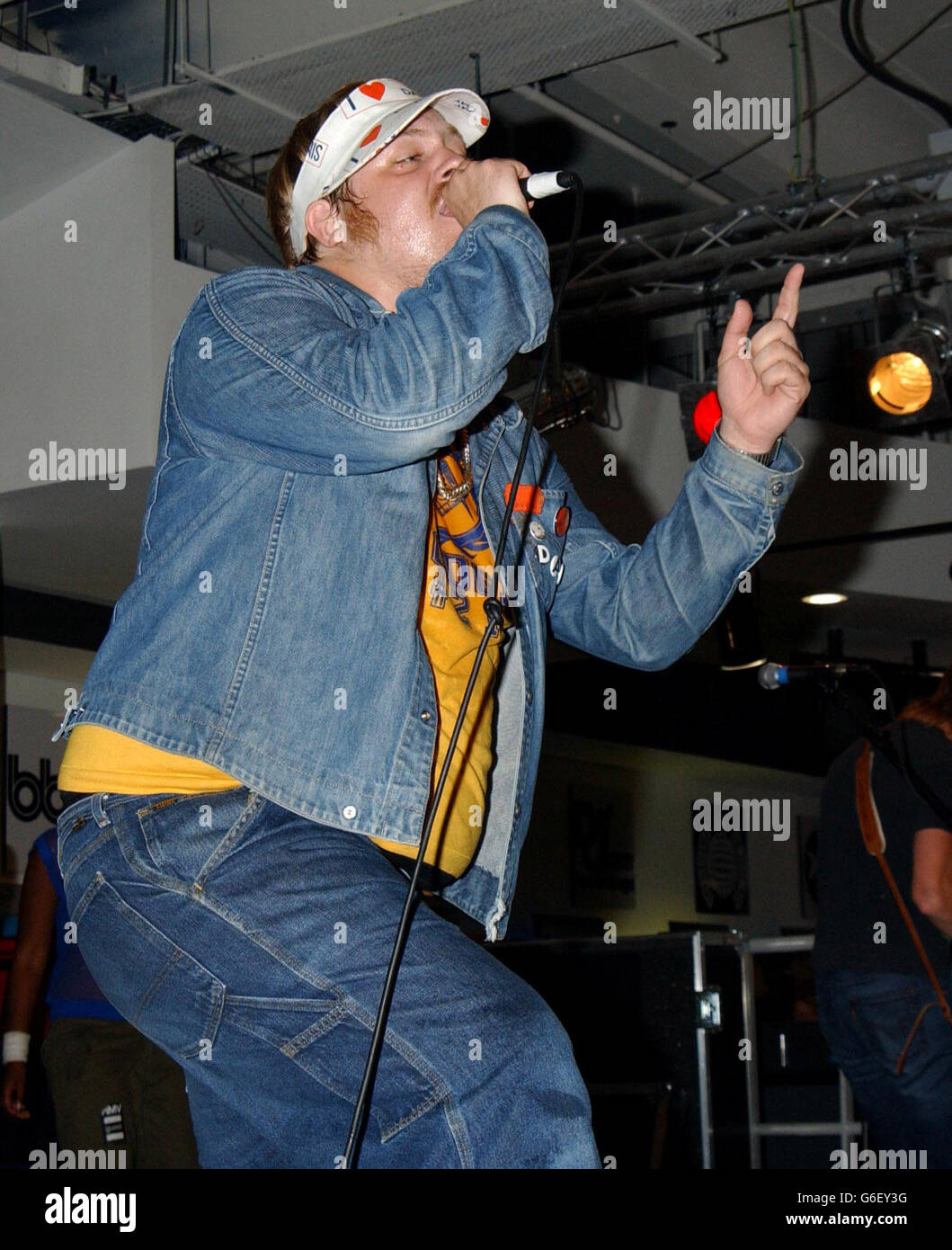 A member of Danish duo Junior Senior performing on stage at HMV in ...