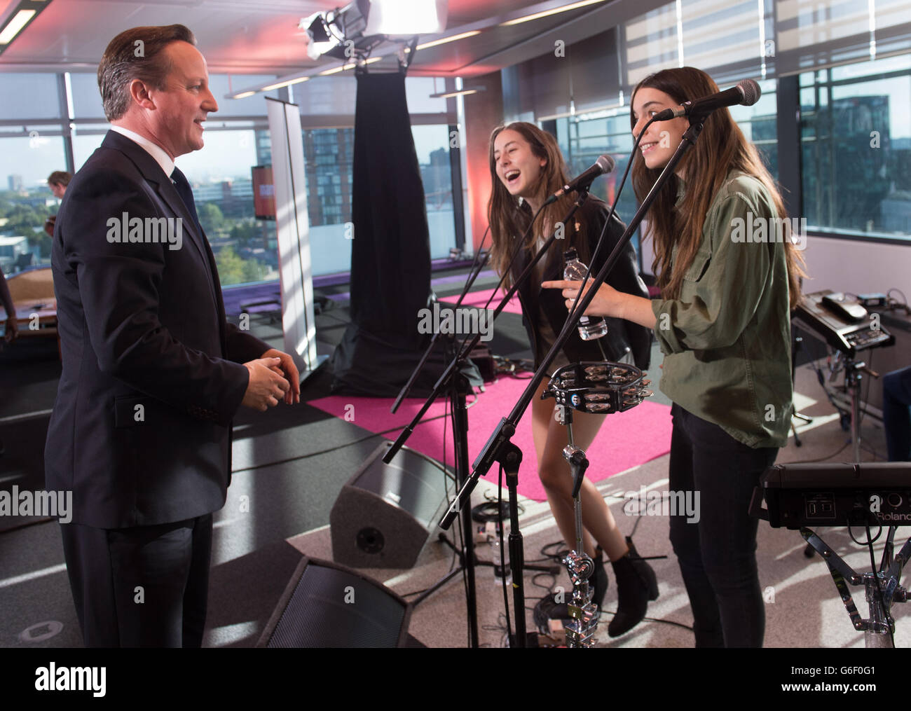 Prime minister david cameron with rock band haim hi-res stock ...