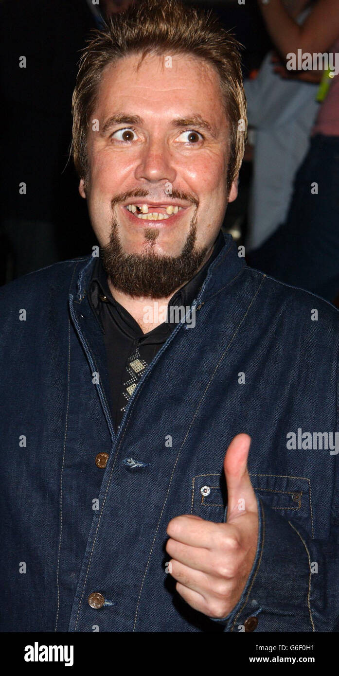 Celebrity film missing teeth toothless smiling thumbs up jerry dammers ...