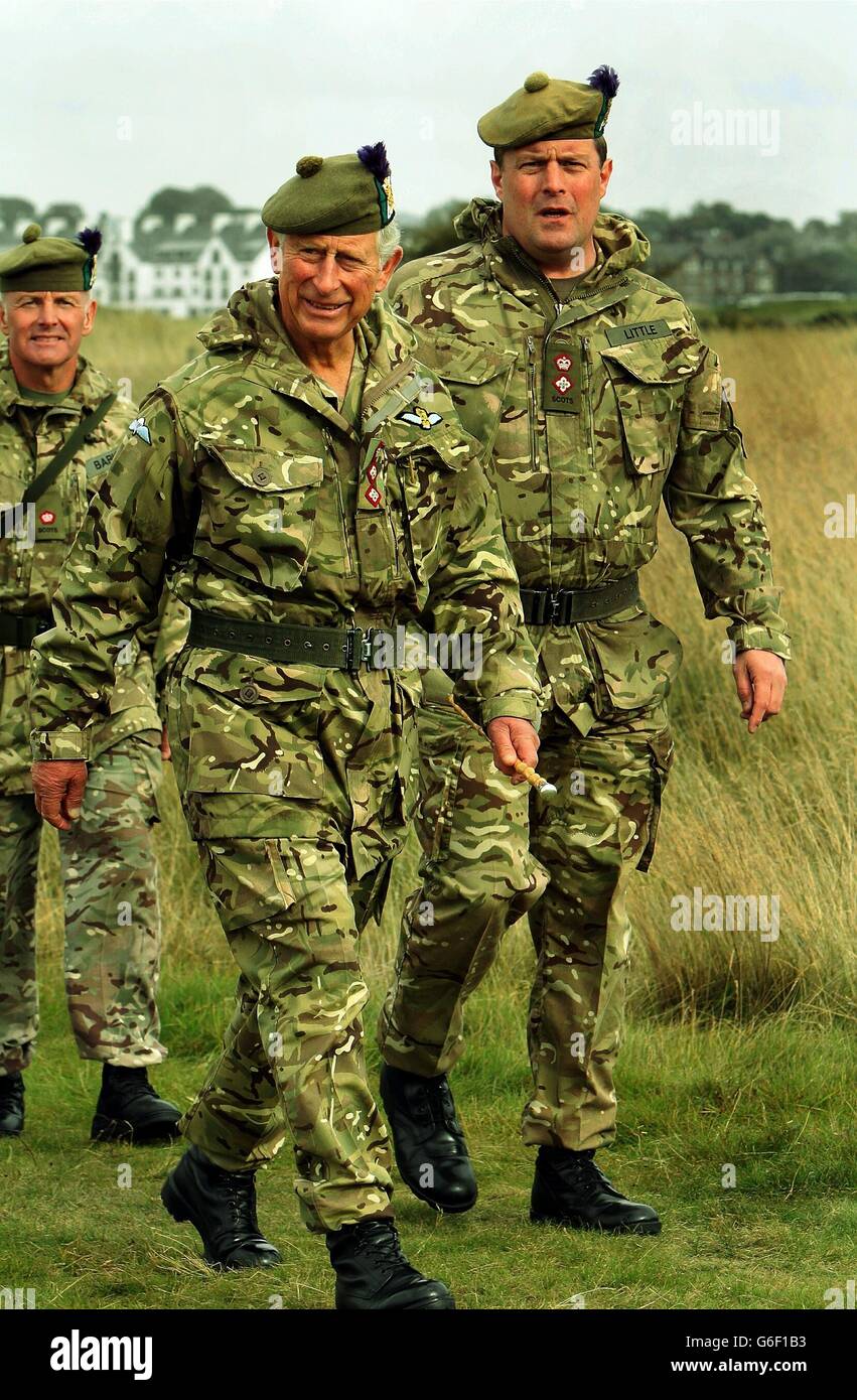 The Prince of Wales arriving to be met by Lt Col Peter Little (right ...