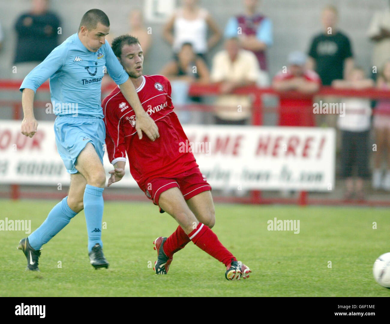 Crawley's Lee Riddelland (right) Tottenham's Ronnie Henry, during their ...
