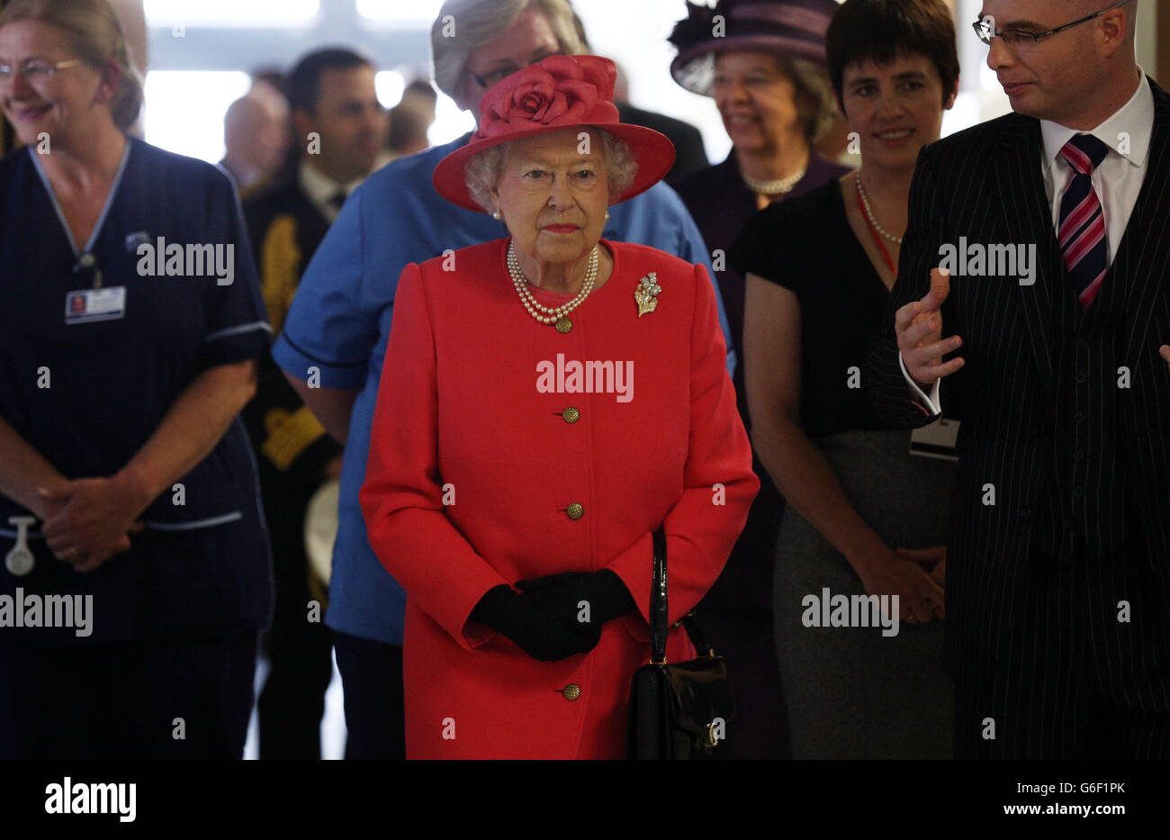 Queen Elizabeth II talks to patients and staff as she officially opens ...