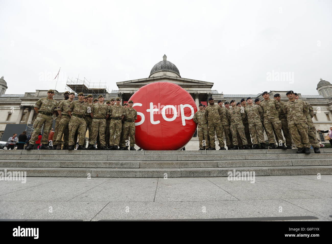 Soldiers hold aloft an inflatable wheel in Trafalgar Square during the ...
