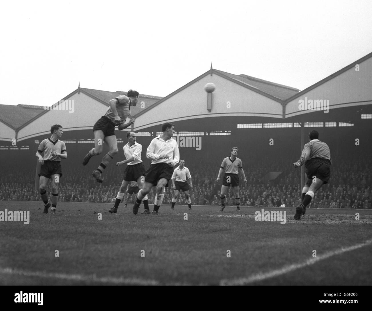 Wolverhampton Wanderers' Jimmy Murray heads the ball to teammate Peter ...