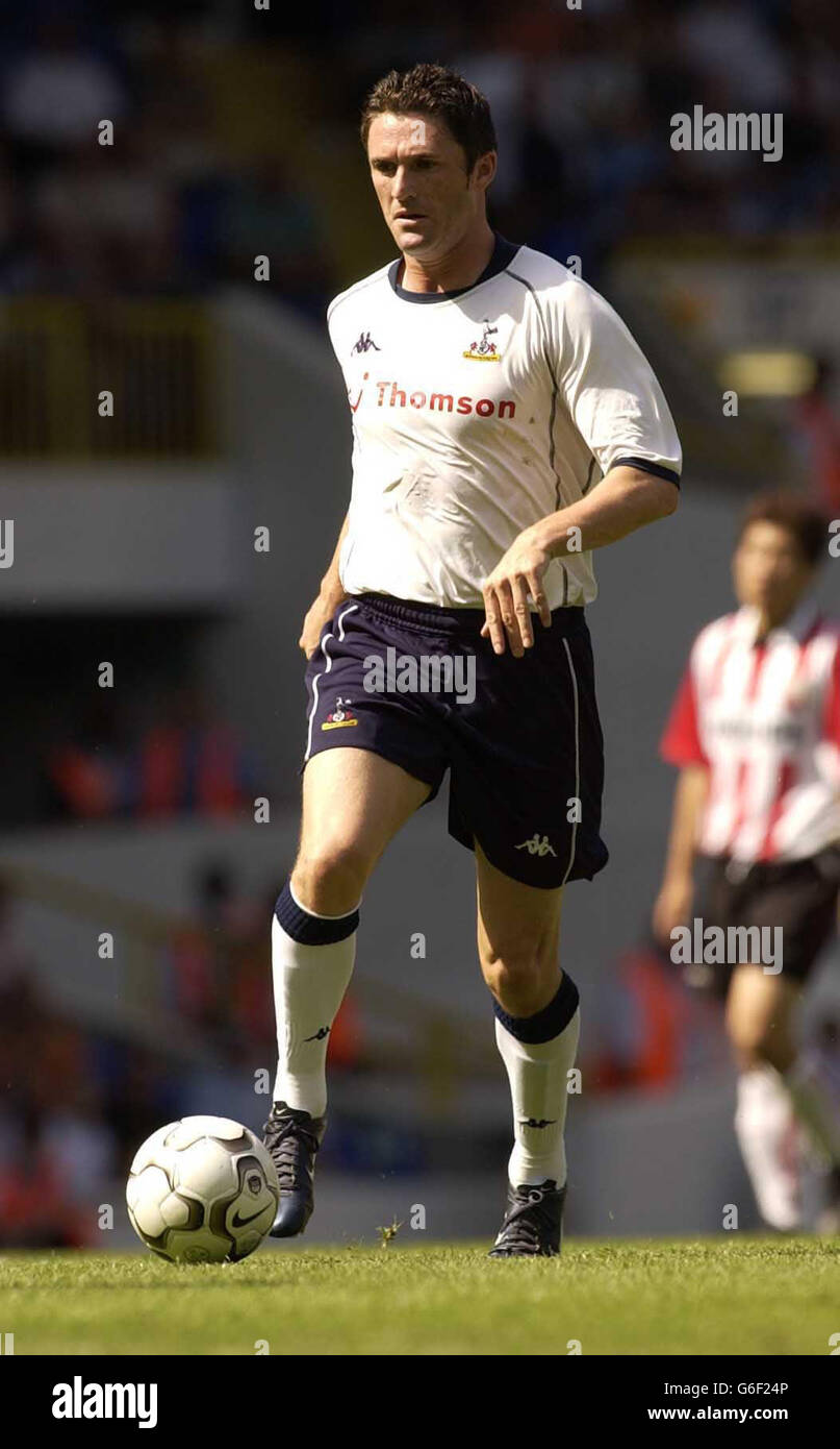 Sport football action spurs robbie keane hi-res stock photography and ...