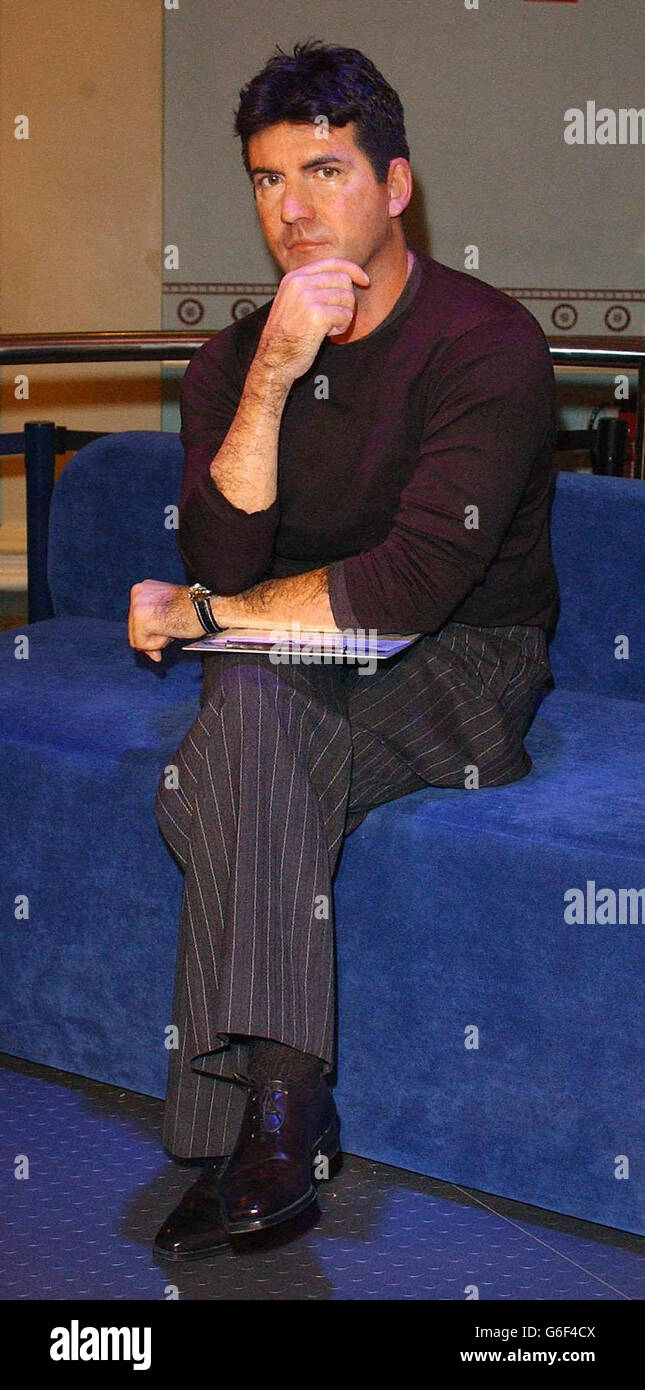 Simon Cowell waxwork at Madame Tussauds Stock Photo - Alamy