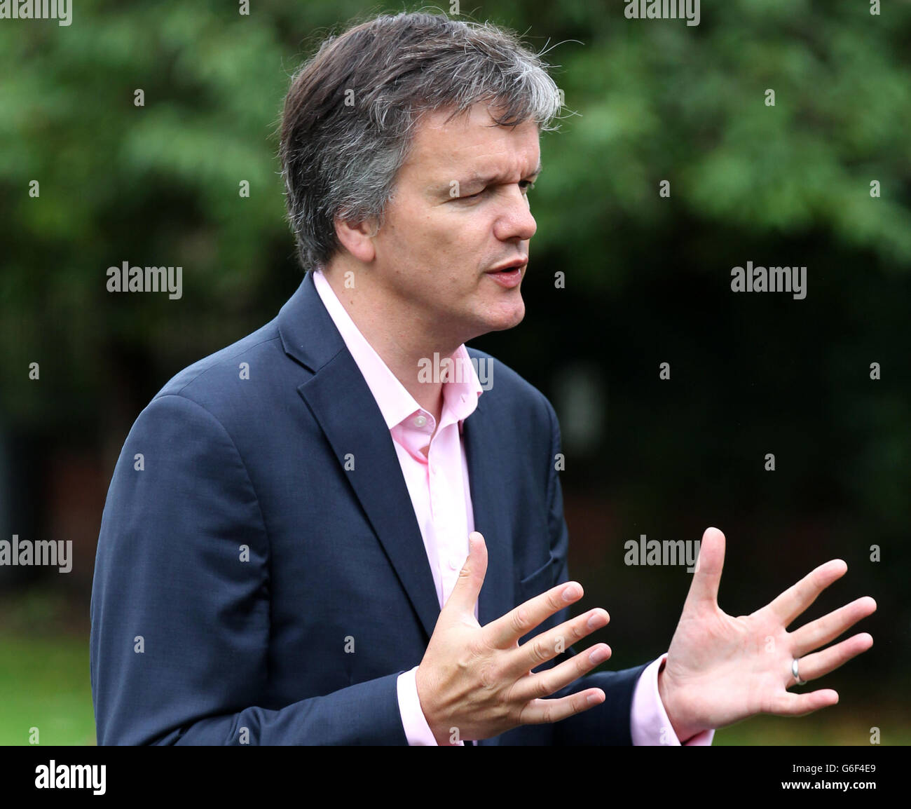 Liberal Democrat MP Michael Moore speaks to a TV crew close to his ...