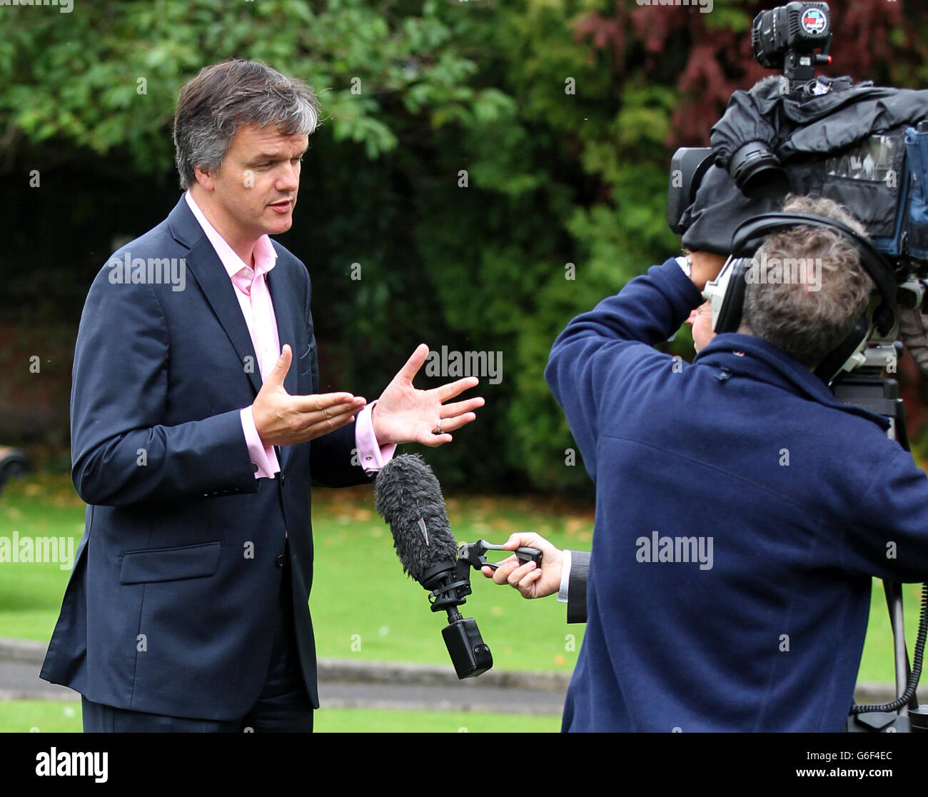 Liberal Democrat MP Michael Moore speaks to a TV crew close to his ...