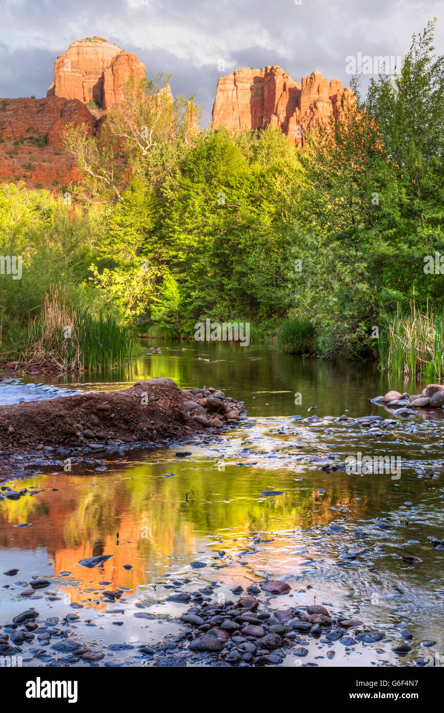 Cathedral Rock is reflected in Oak Creek in Red Rock Cross-Crescent ...