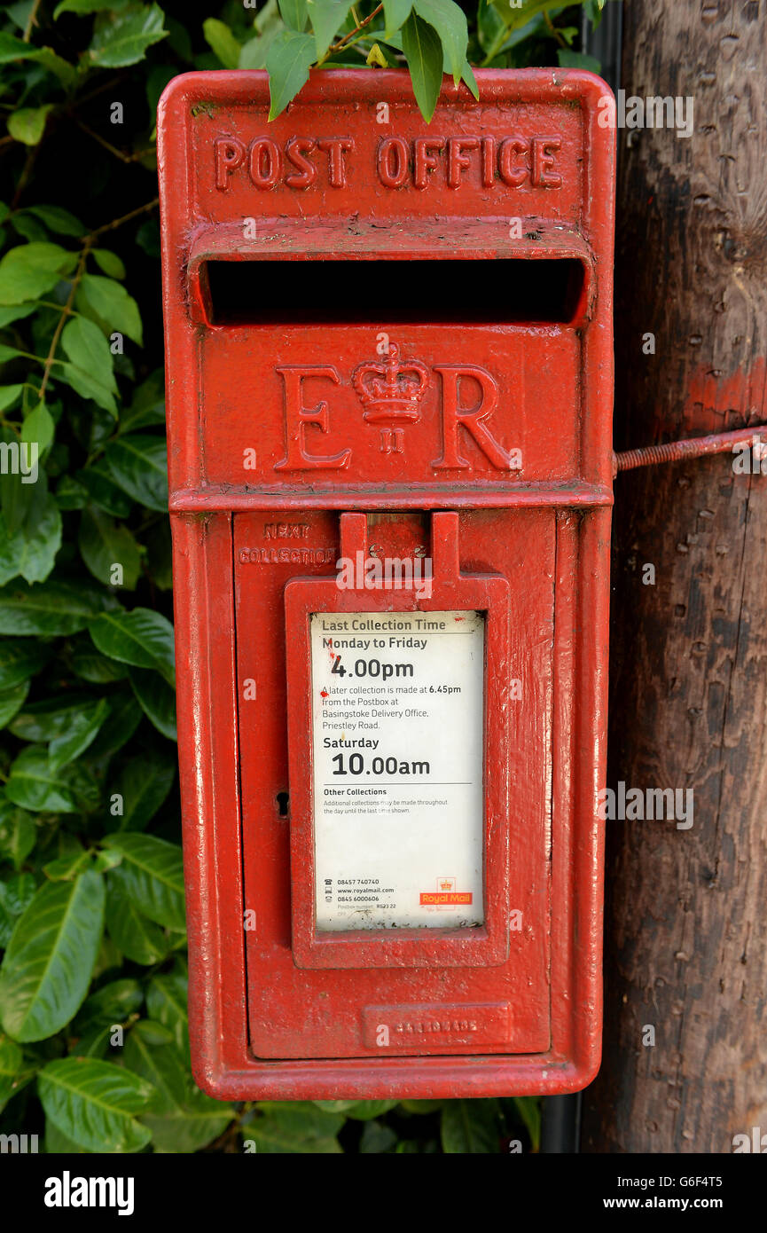 General view of a Post Office post box on the side of a lamp post in ...