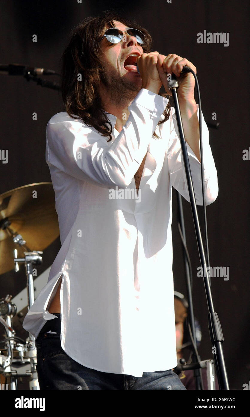 Lead singer Bobby Gillespie from the band Primal Scream performing on ...