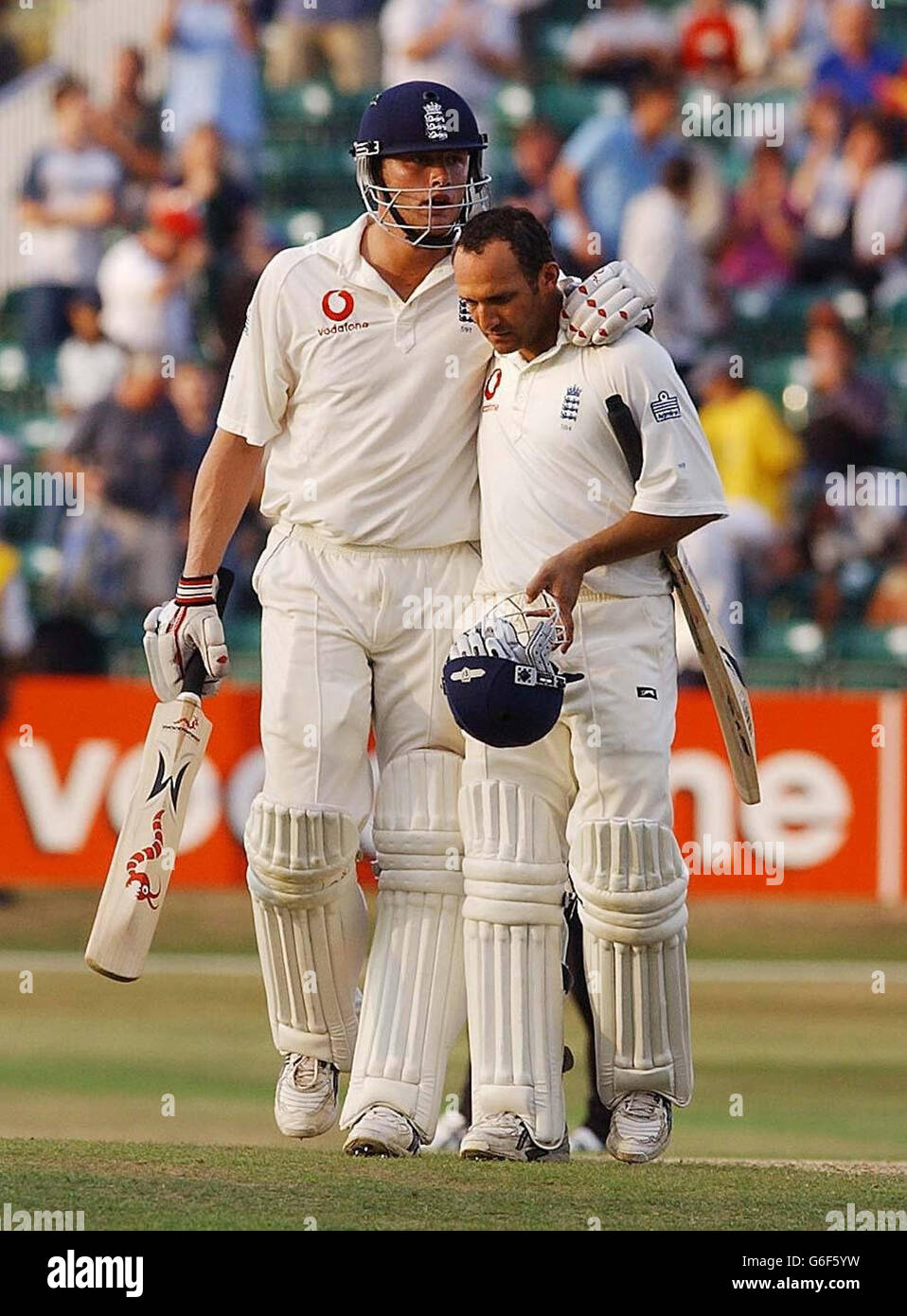Englands'Andrew Flintoff (left) and Mark Butcher embrace after a strong ...