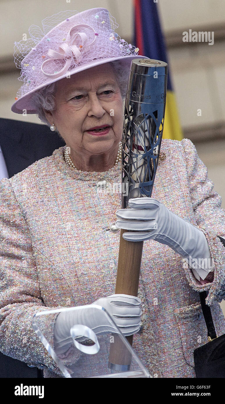 Queen Elizabeth II stands in front of Commonwealth country flags during ...