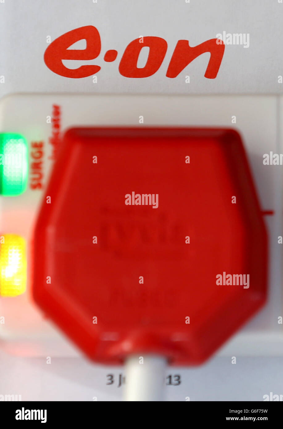 General view of the e.on energy company logo alongside a plug socket ...