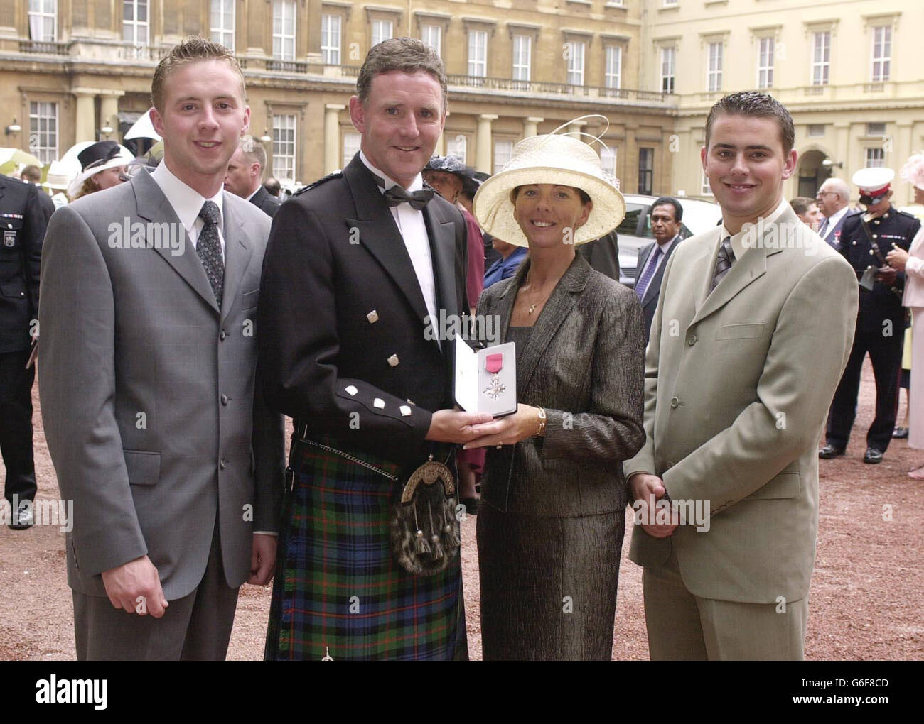 Scottish football referee Hugh Dallas receives the Most Excellent Order ...