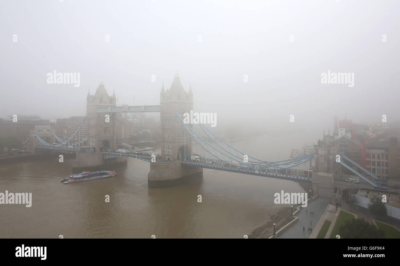 A general view of Tower Bridge in fog in central London Stock Photo - Alamy