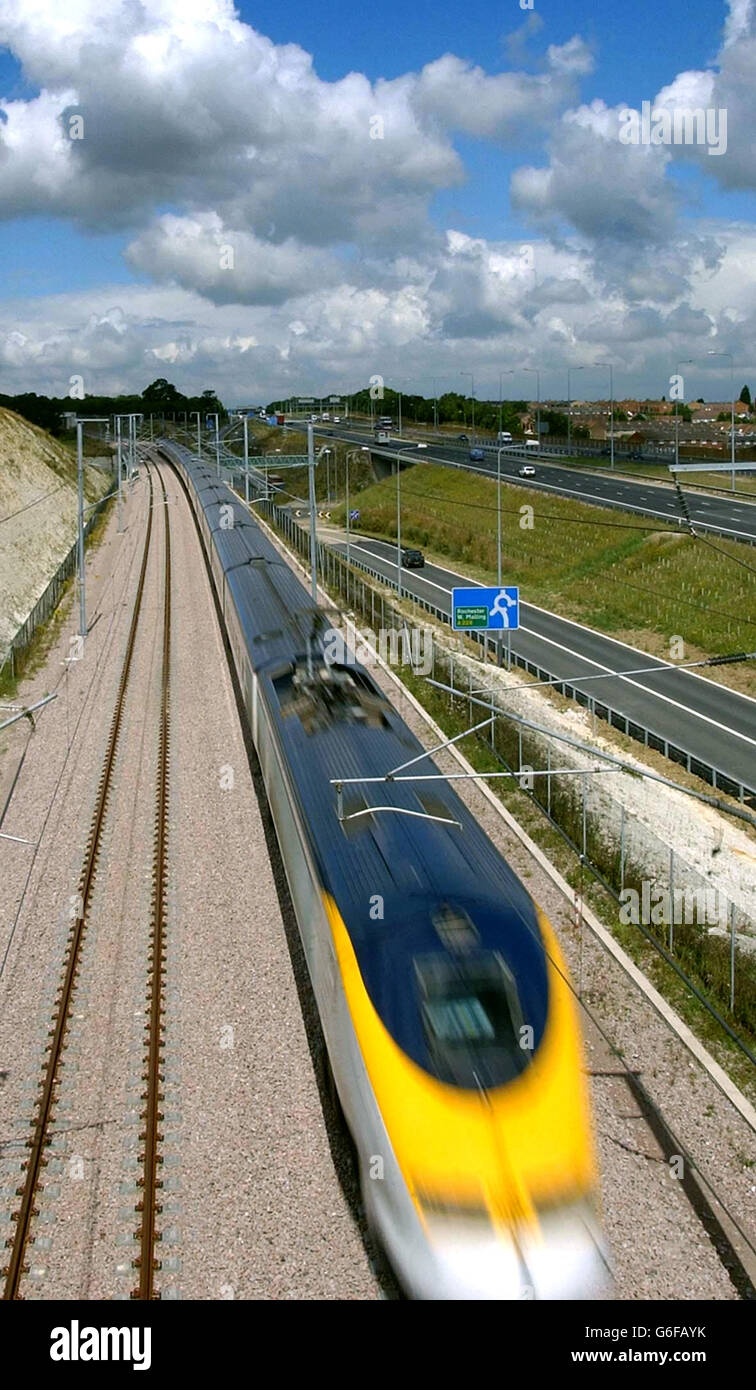 A Eurostar train passes alongside the M2 in Kent on its way to breaking ...