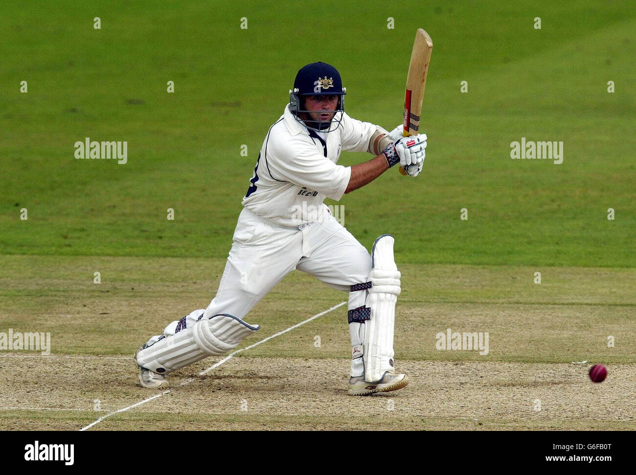 Gloucestershire's Matt Windows drives a shot to the boundary during his ...