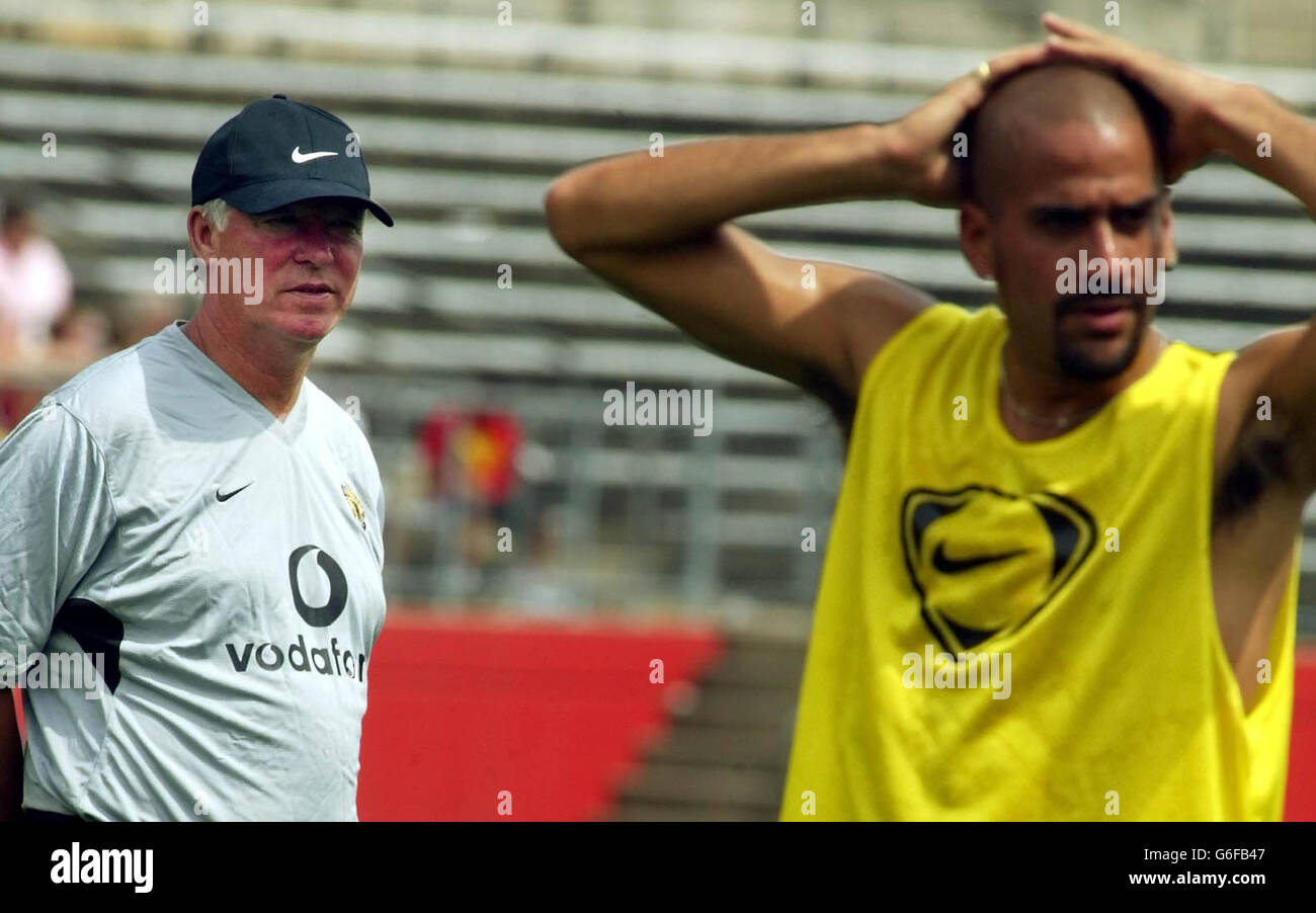 Manchester United Manager Sir Alex Ferguson (left) watches Juan ...