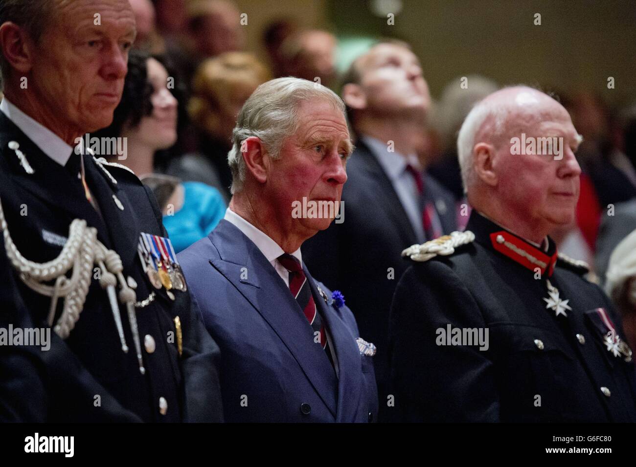 The Prince of Wales sits with Sir Bernard Hogan-Howe Commissioner of ...