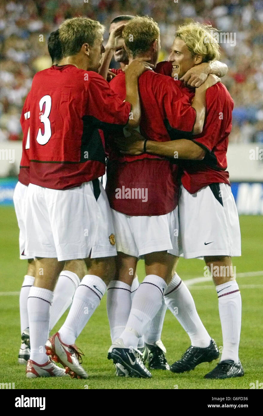 Manchester United's Diego Forlan (right) celebrates his goal against ...