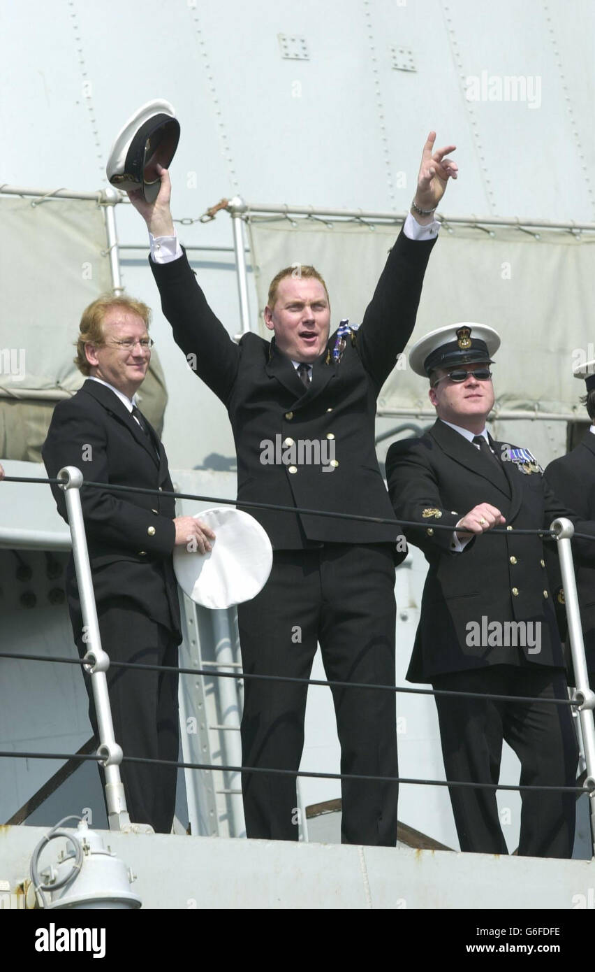 A sailor celebrates on HMS Liverpool as the ship docks at Portsmouth ...
