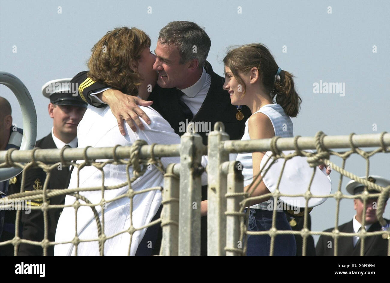 Commander of HMS Liverpool Martin Ewence greets his wife Julia and ...