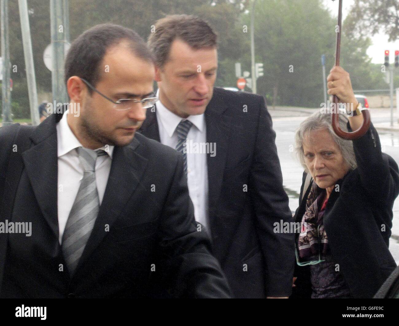 Madeleine McCann's father Gerry McCann (centre) leaves the Palace of ...