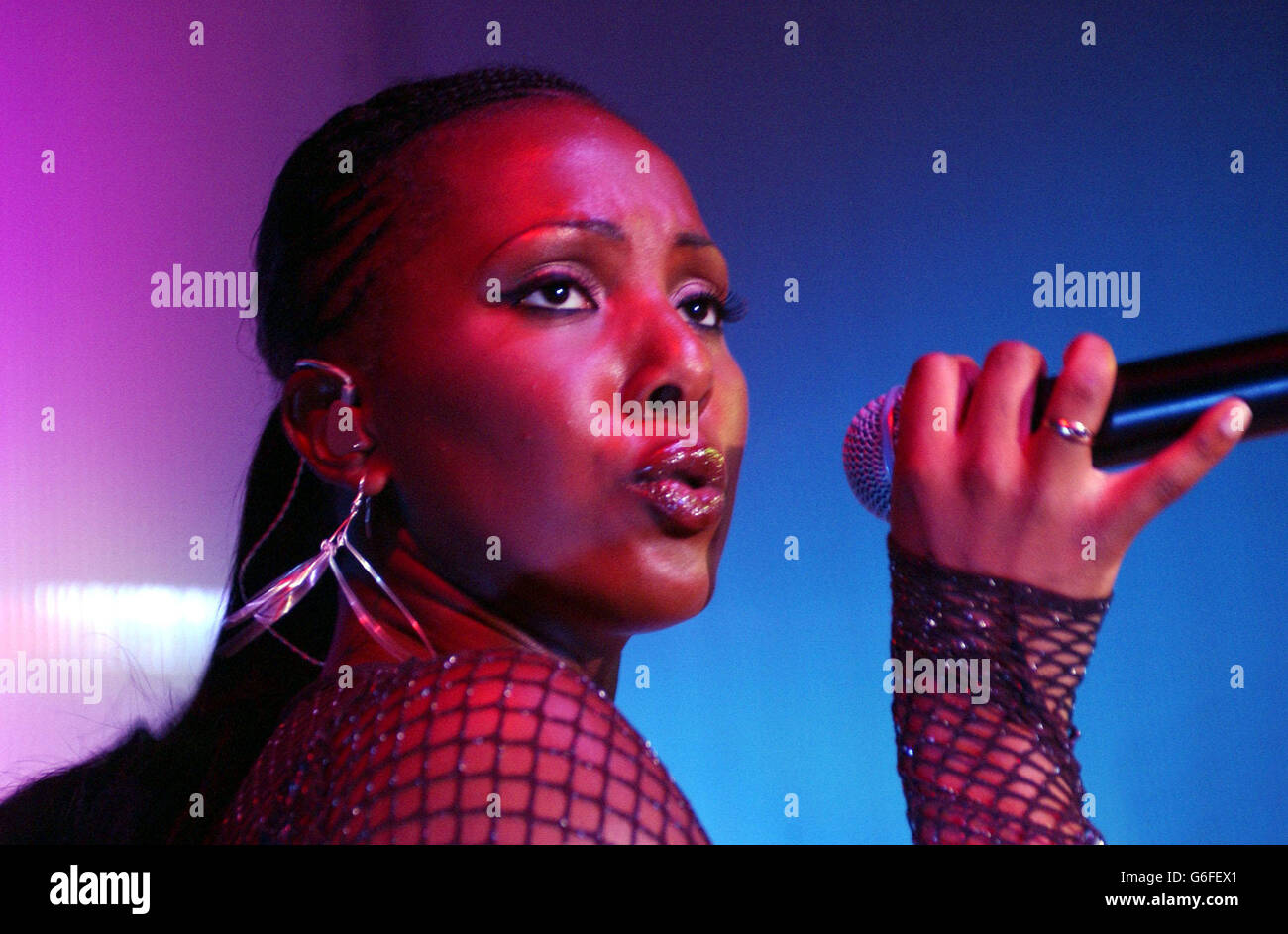 Celebrity music pop band on stage performing singing kelli young hi-res ...