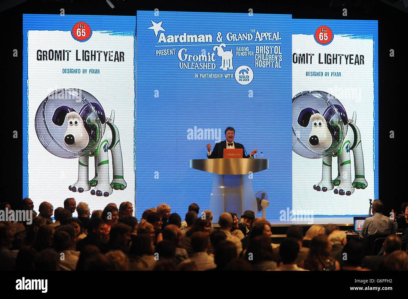 Auctioneer Tim Wonnacott takes bids on "Gromit Lightyear" during a ...