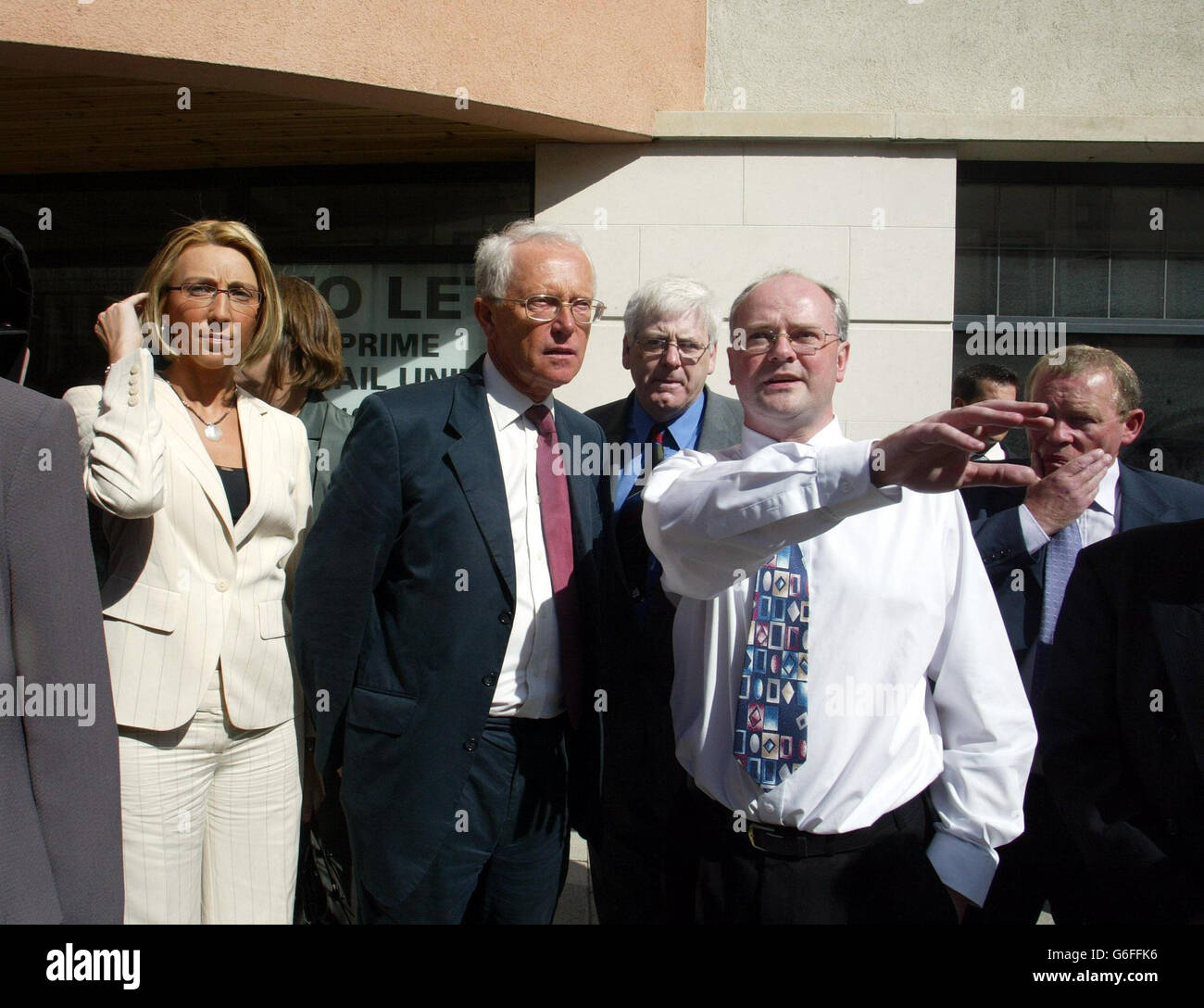 Lord Filkin (second left), permanent under secretary at the Department ...