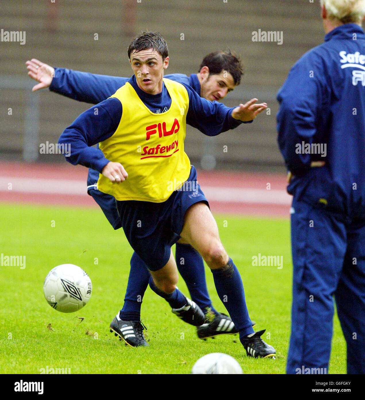 Scotlands maurice ross front in action against team mate christian ...