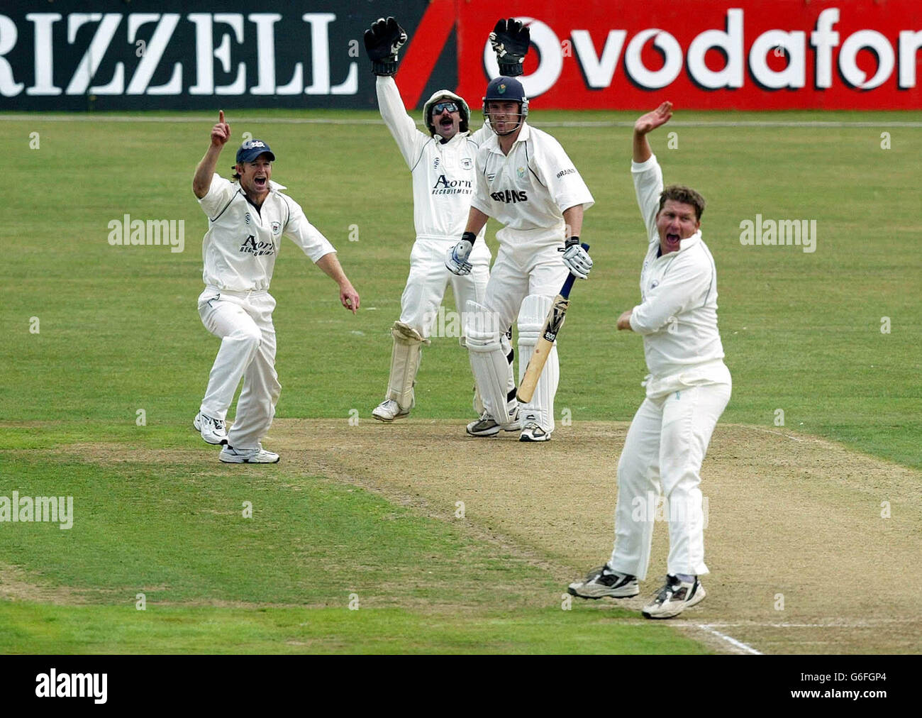 Gloucestershire's Jonty Rhodes (left) and wicketkeeper Jack Russell ...