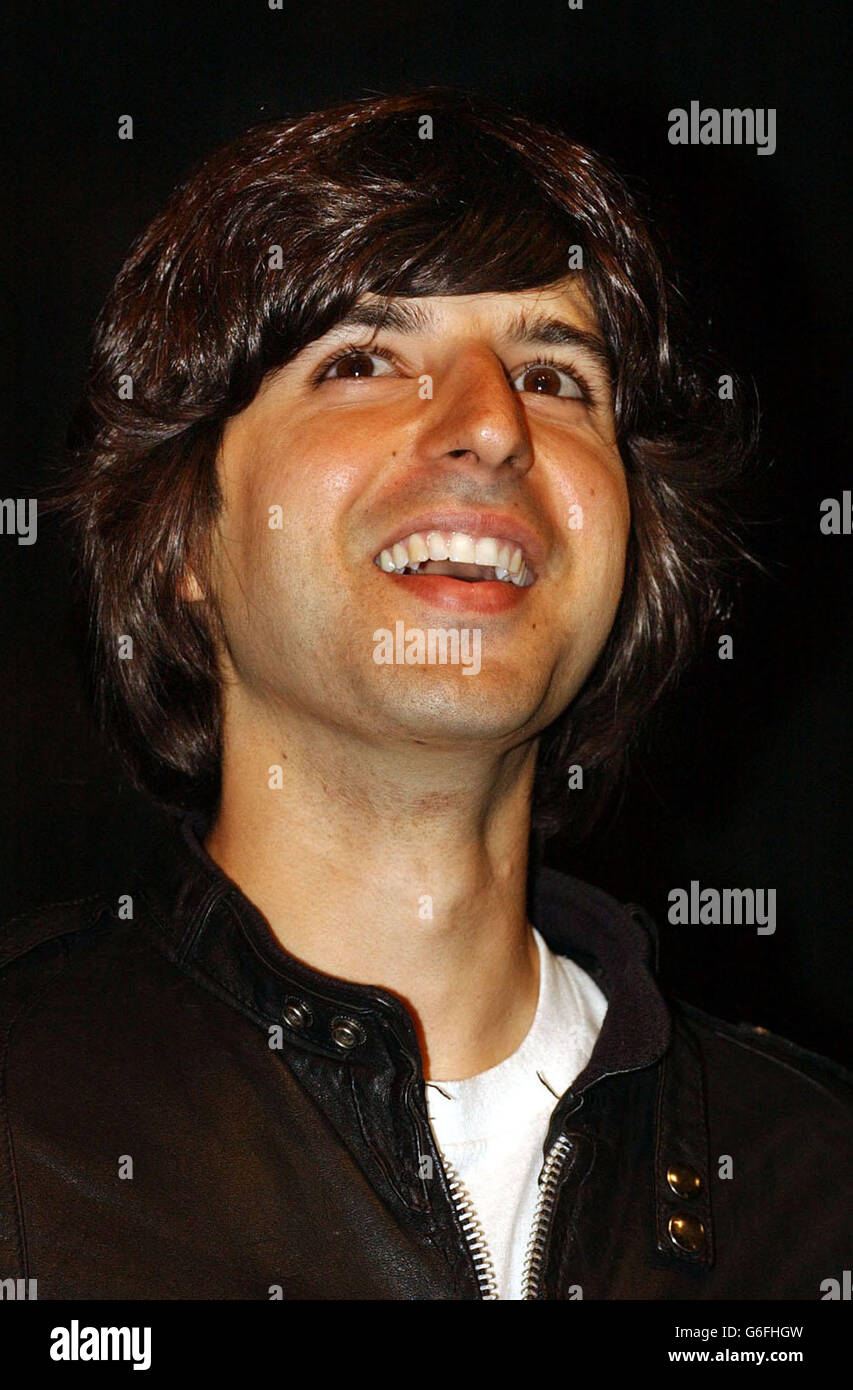Demetri Martin holds up the Perrier award at a photocall for the ...
