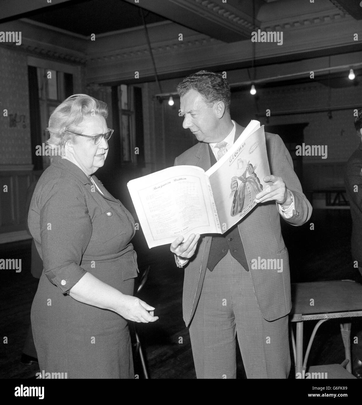 Composer Benjamin Britten goes over the score his opera Gloriana with ...