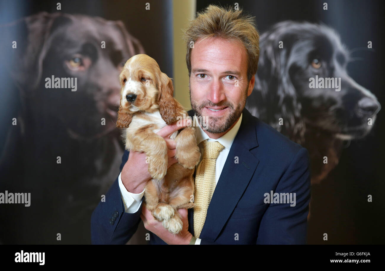 Ben Fogle poses with hearing dog puppy Aslan at The Hearing Dog Awards ...