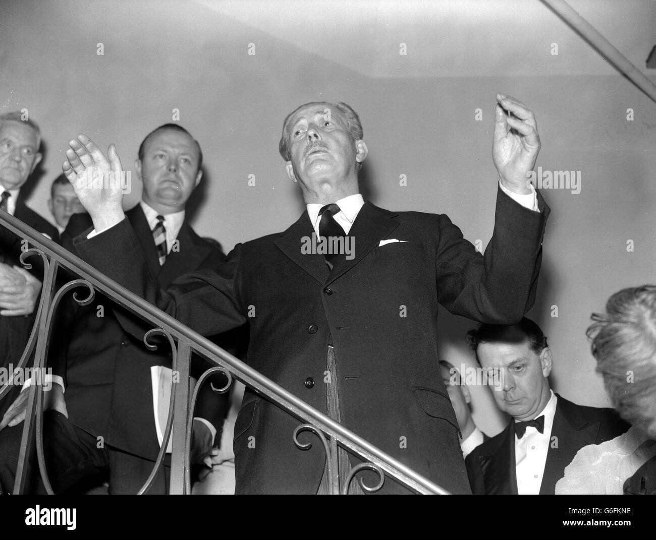 Harold MacMillan lifts his arms in a gesture of triumph at Conservative ...