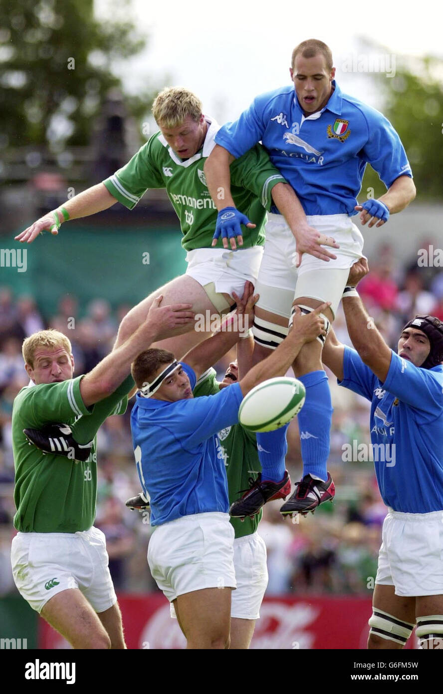 Italy's Sergio Parisse (top right) beats Ireland's Eric Miller in the ...