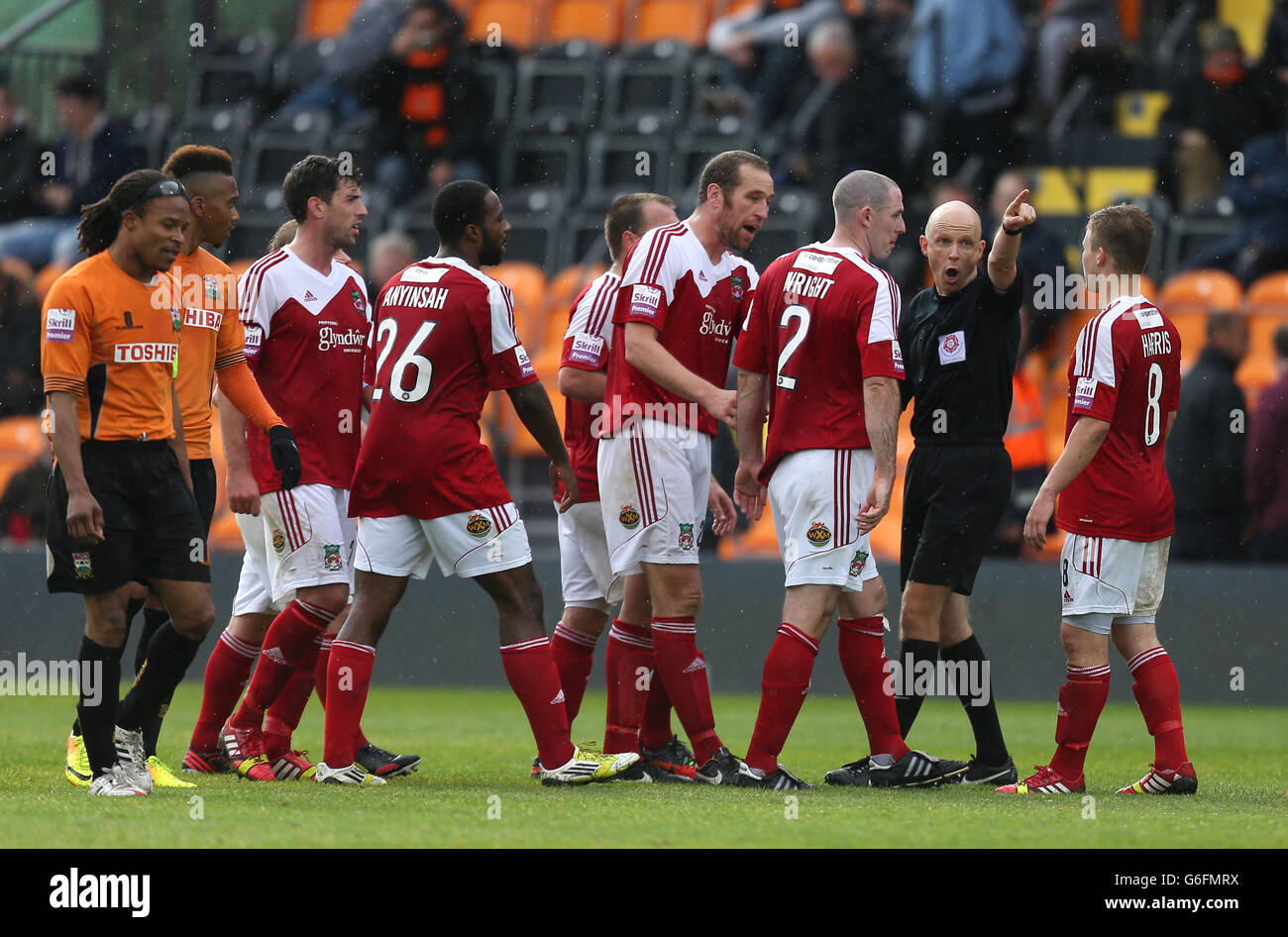 Referee Nick Kinseley sends off Wrexham's Stephen Wright (left of ...