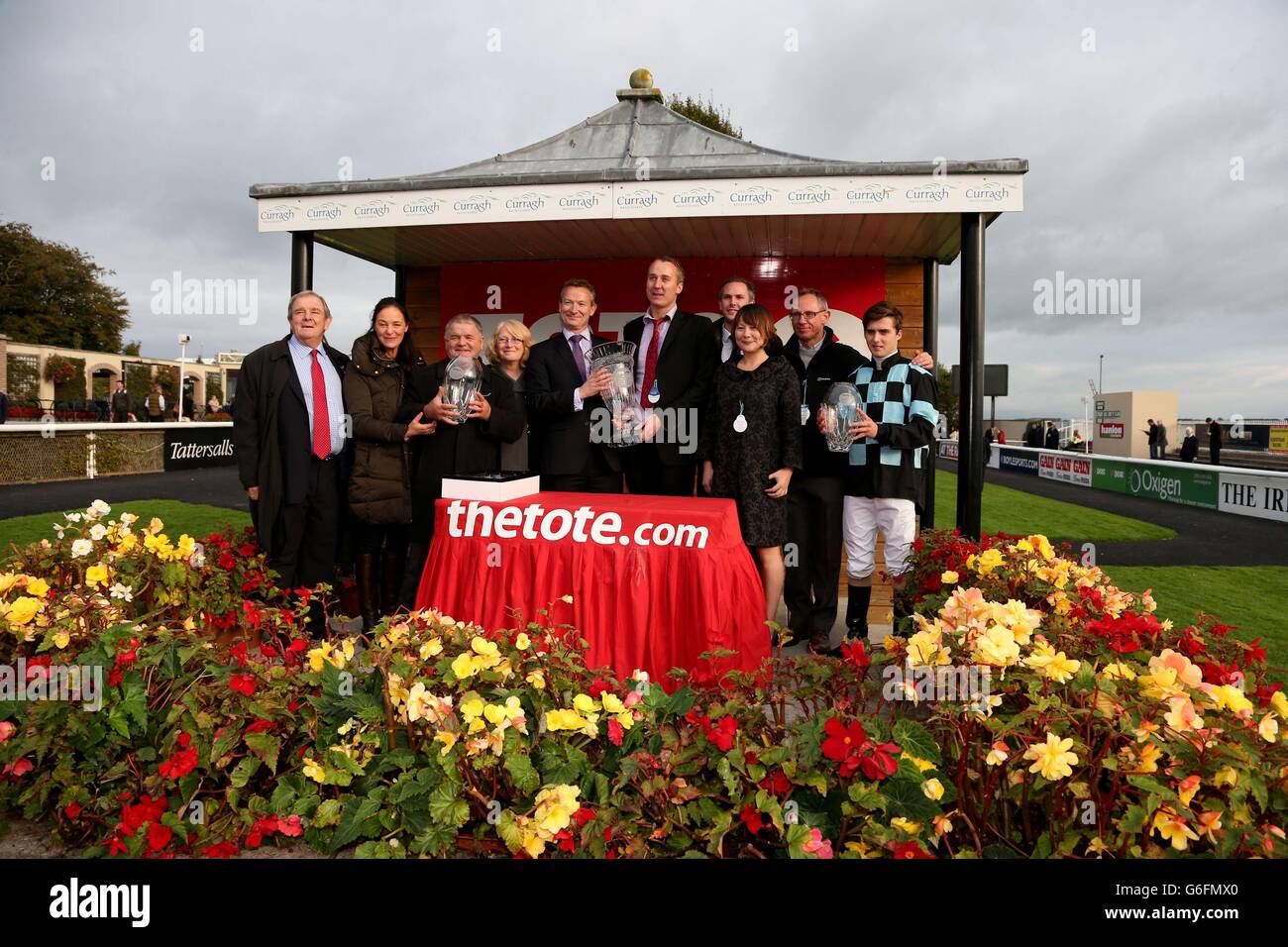 Jockey Robert Tart (right) and trainer Brian Ellison (third from left ...